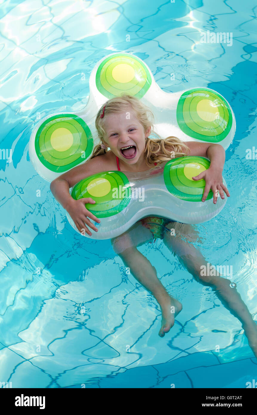 lovely little child laughing in the swimming pool Stock Photo - Alamy