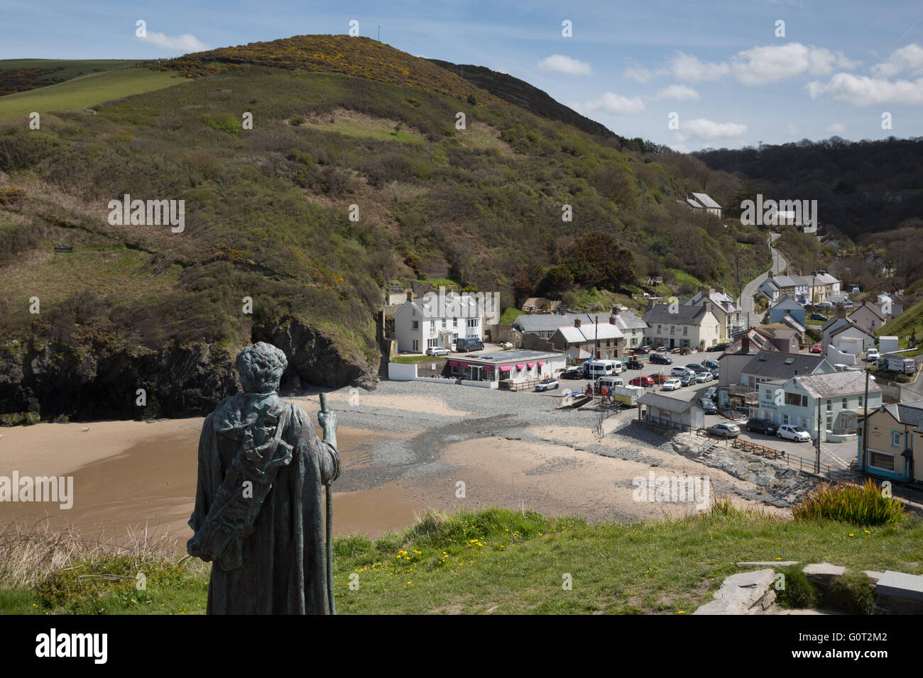 The statue of Saint Caranog, on the Wales Coast Path at Llangrannog, on ...