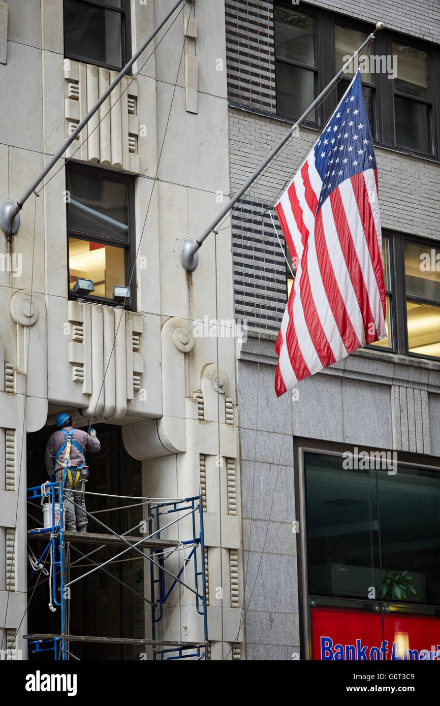 New york A construction builder workman working users the flag stars ...
