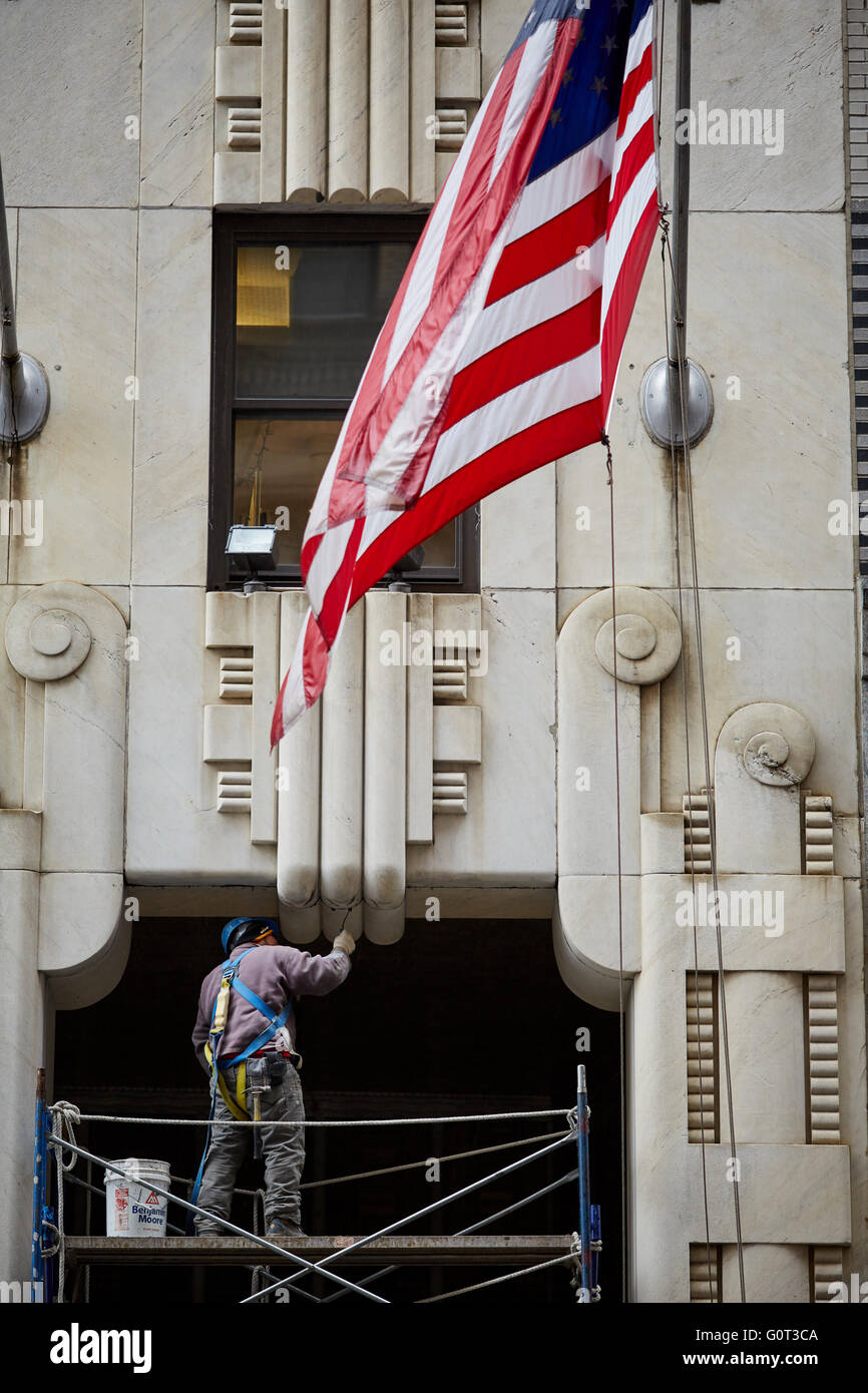 New york A construction builder workman working users the flag stars ...