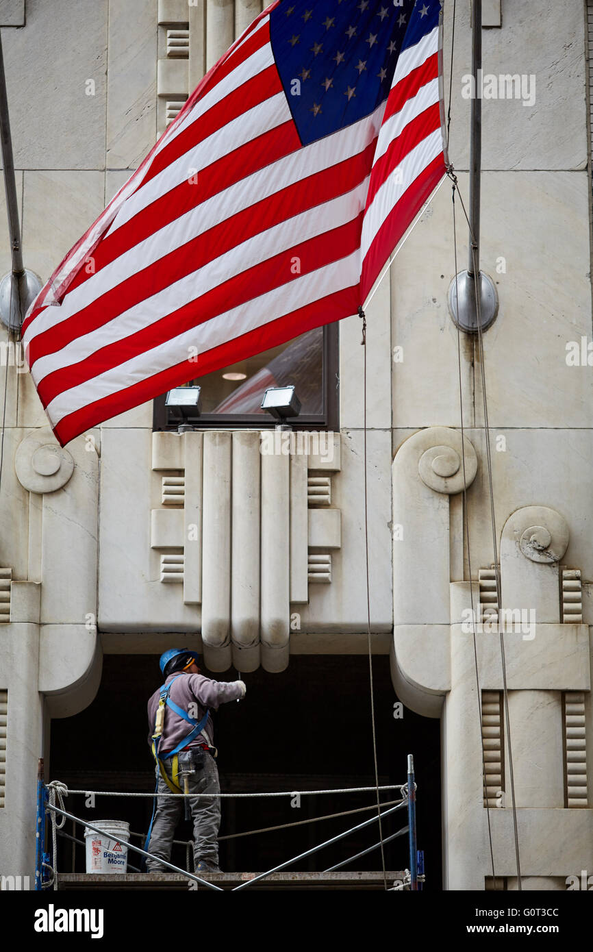 New york A construction builder workman working users the flag stars ...