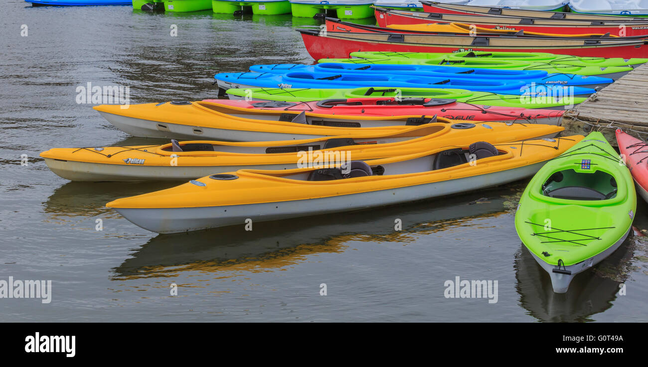 Colorful kayaks on water Stock Photo - Alamy
