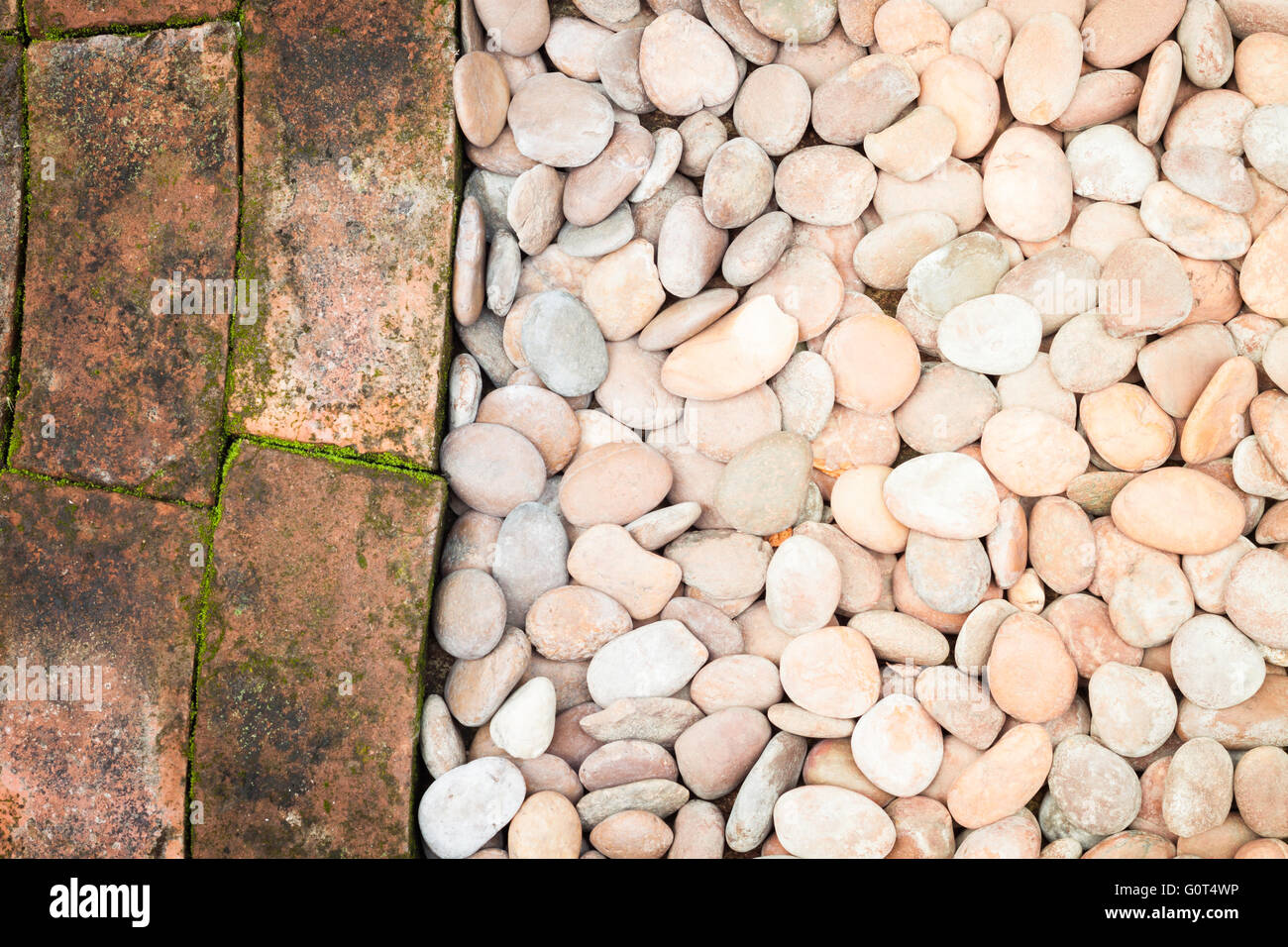 Pebble stones and bricks abstract background, stock photo Stock Photo ...