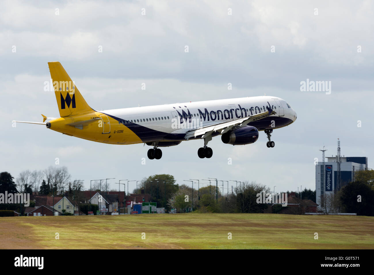 Monarch Airlines Airbus A321 landing at Birmingham Airport, UK Stock ...