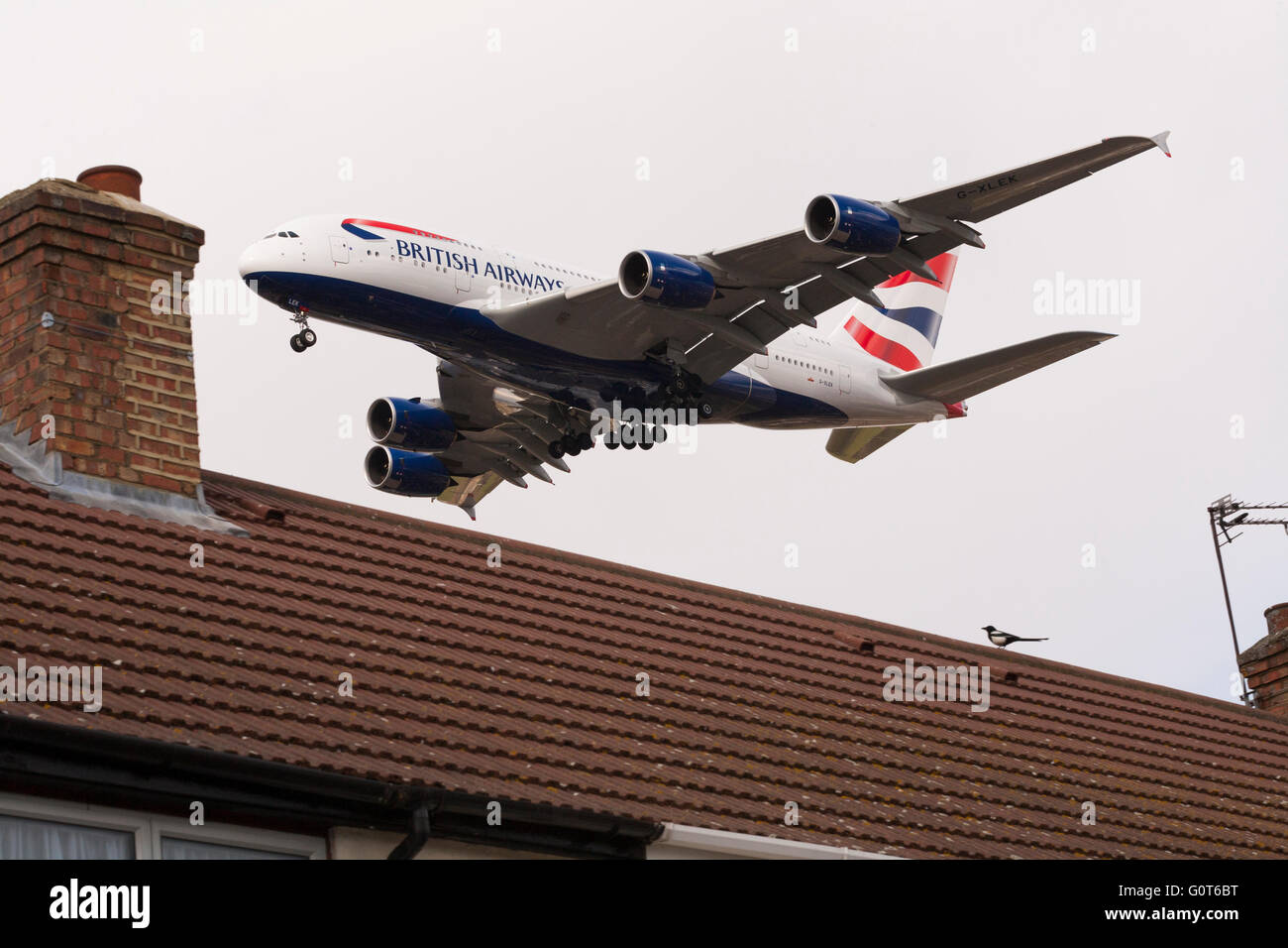 British Airways Airbus A380 - 841 (G-XLEK) landing over roof tops at ...