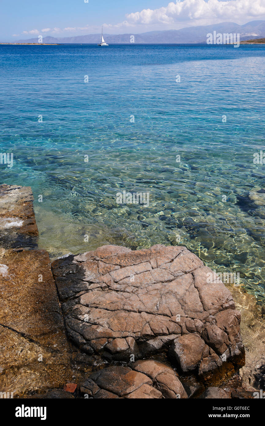 Mediterranean beach at Elounda. Crete. Greece. Vertical Stock Photo - Alamy