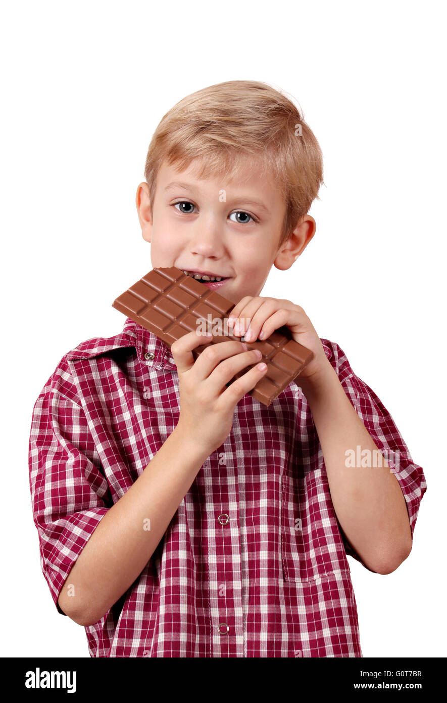 boy eats chocolate Stock Photo - Alamy