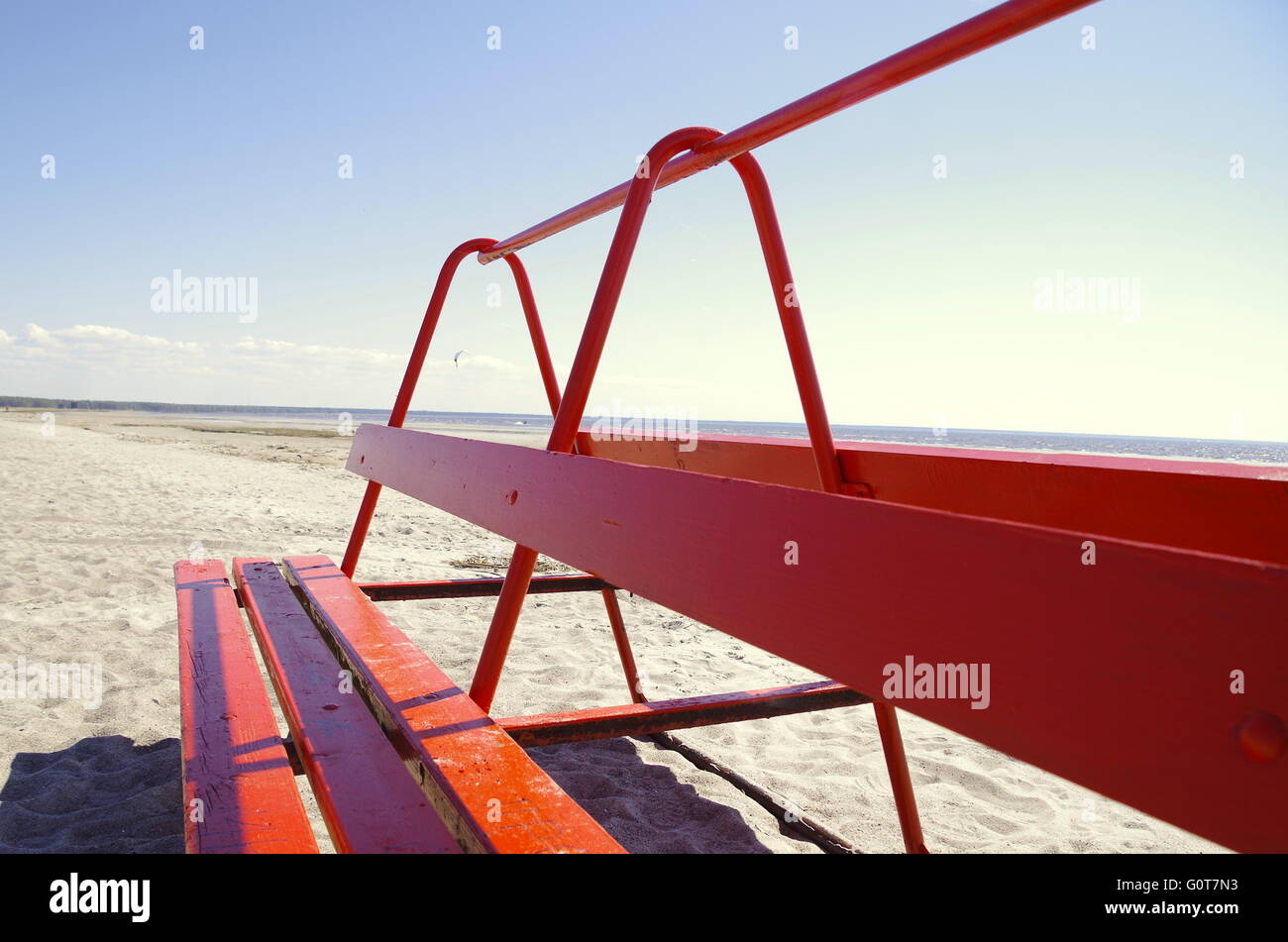 Red beach bench on a first warm spring day in Pärnu beach 2016 Stock ...
