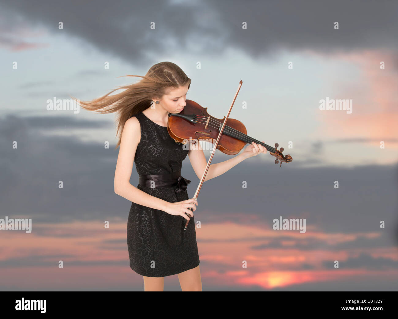 Teenage girl with viola Stock Photo - Alamy