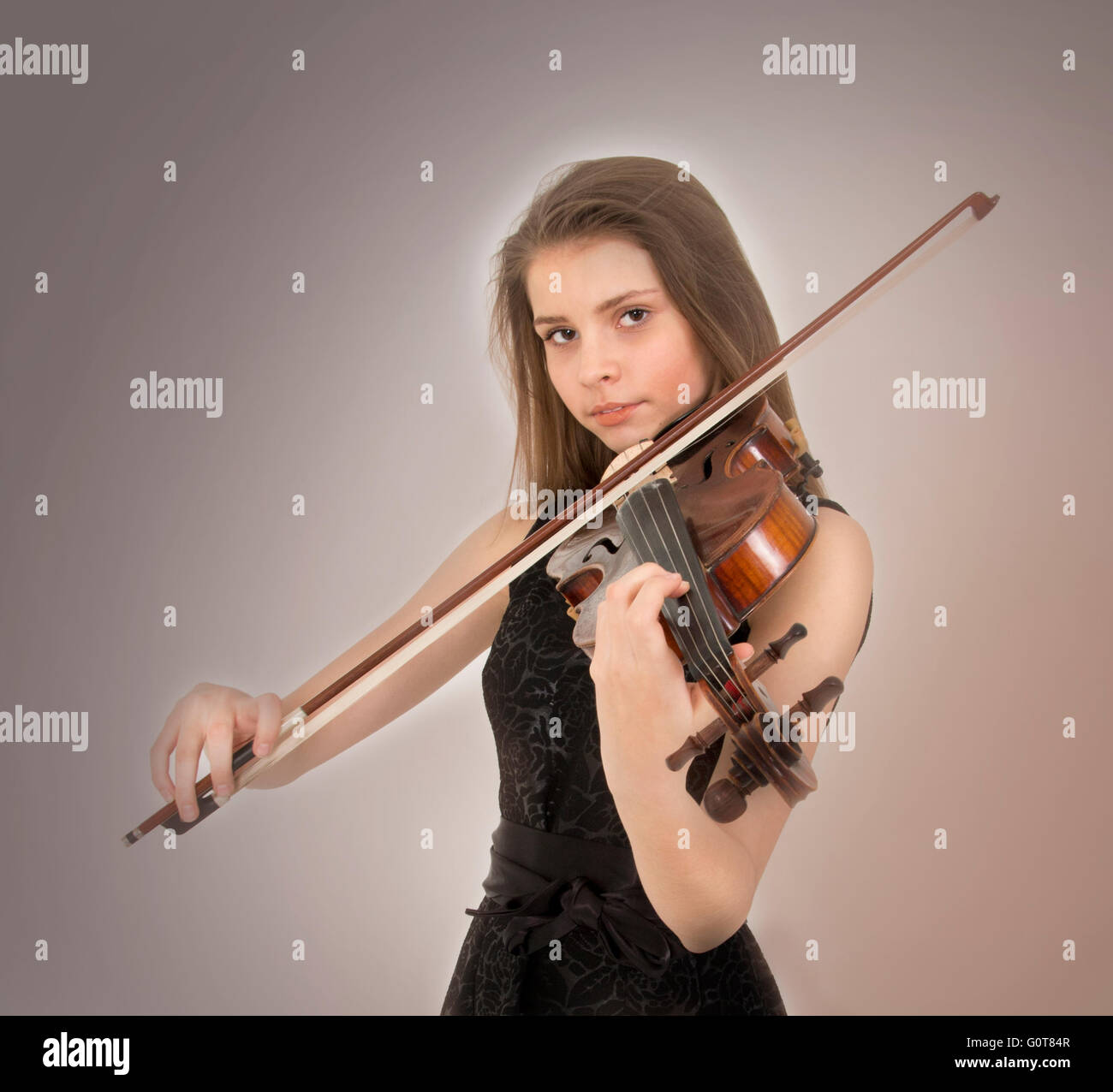 Teenage girl with viola Stock Photo - Alamy