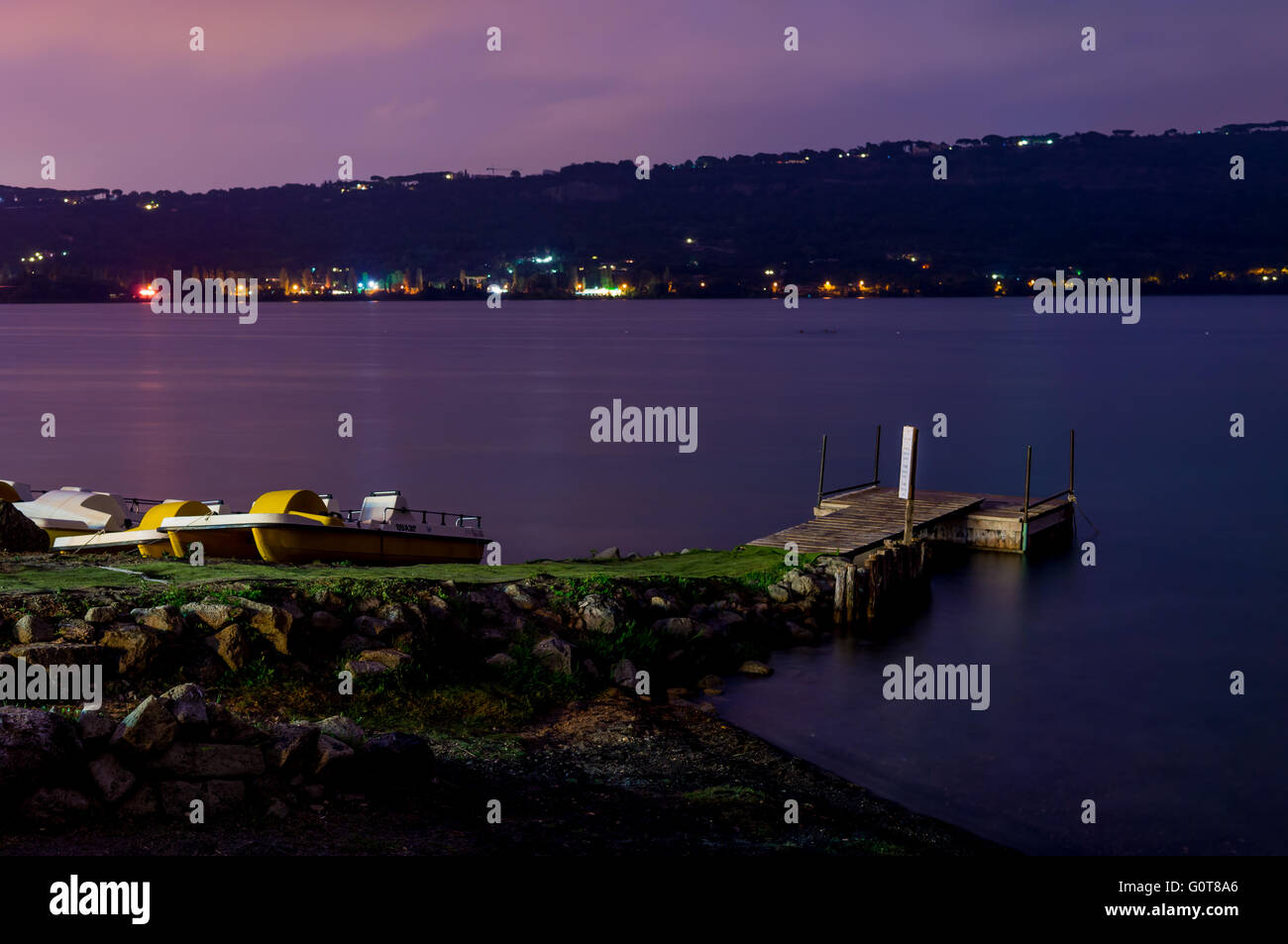 Lake dock at night Stock Photo - Alamy