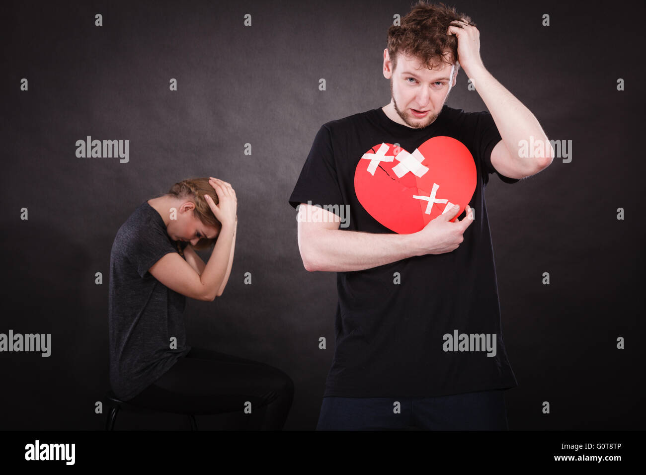 Broken heart difficult love concept. Sad unhappy couple woman and man ...