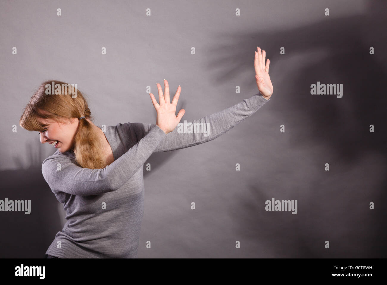 Violence against woman. Scared afraid woman. Negative relations in ...