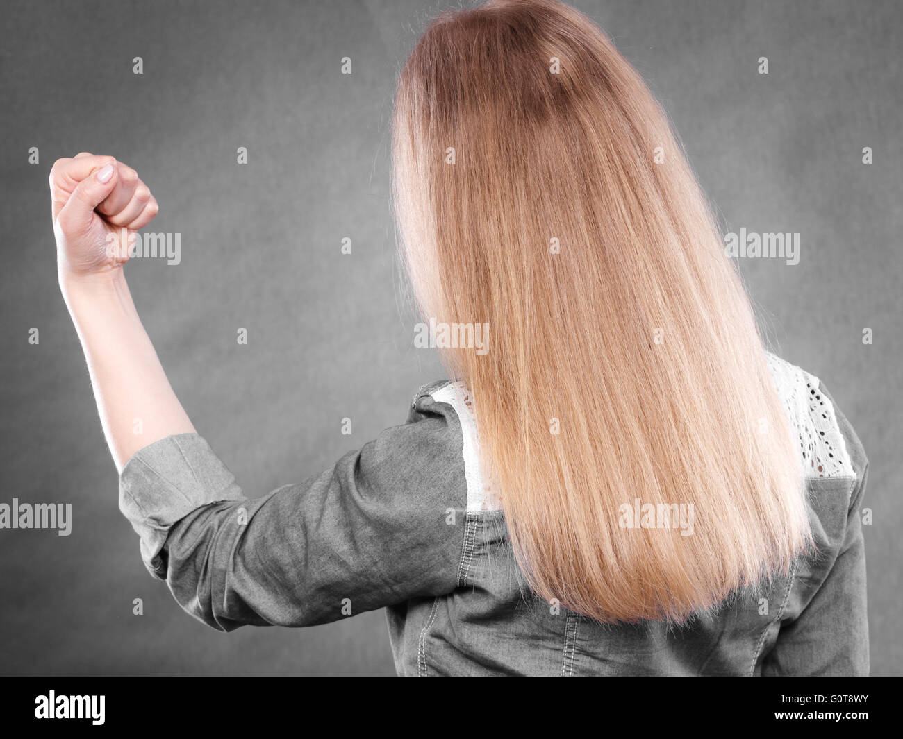 Fury and big anger inside of people. Blonde furious woman making hands ...