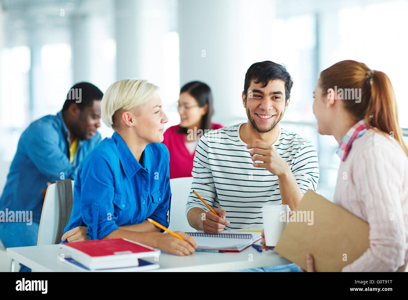 Discussing something funny hi-res stock photography and images - Alamy