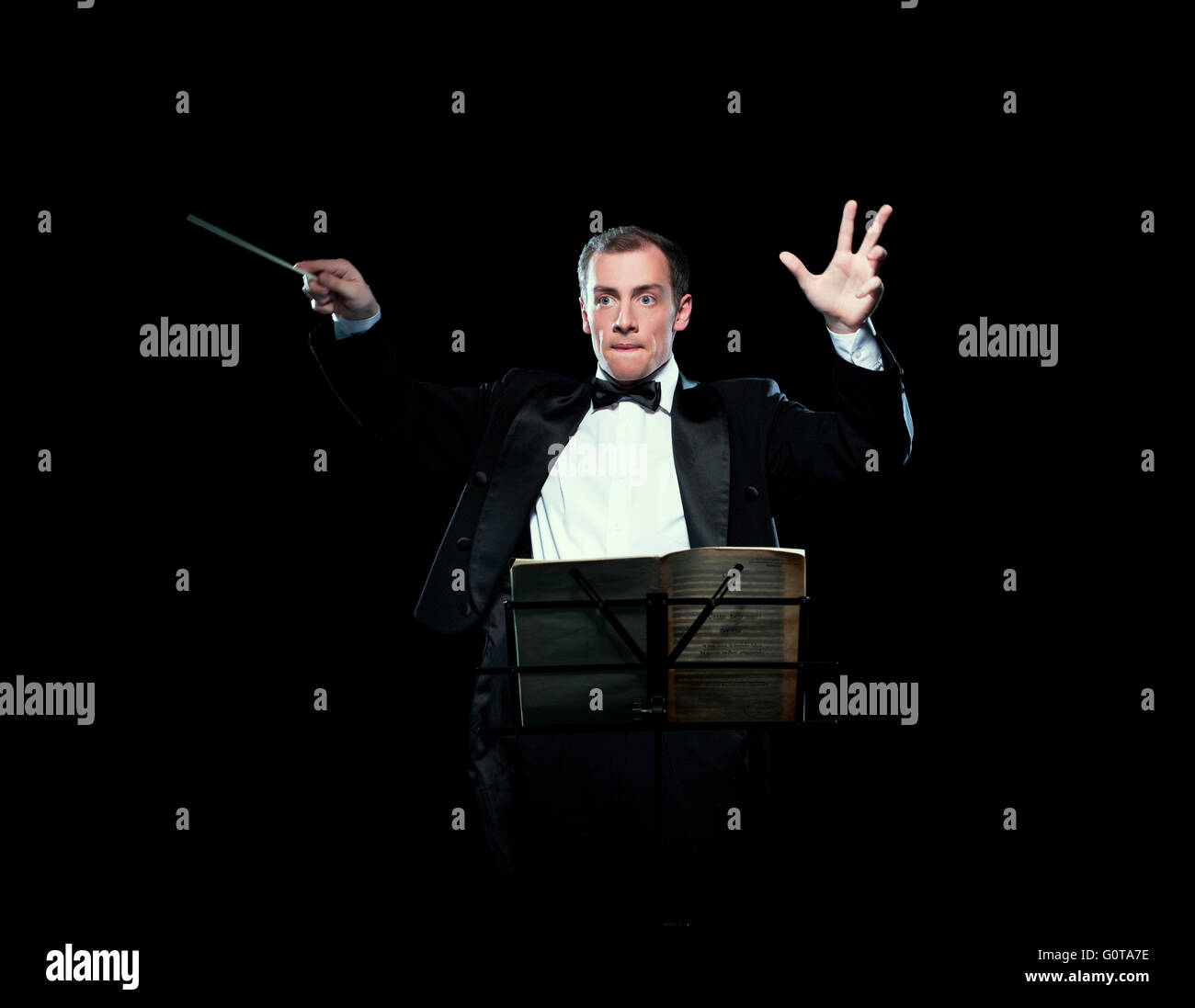 Shot of music director conducting with inspiration Stock Photo - Alamy