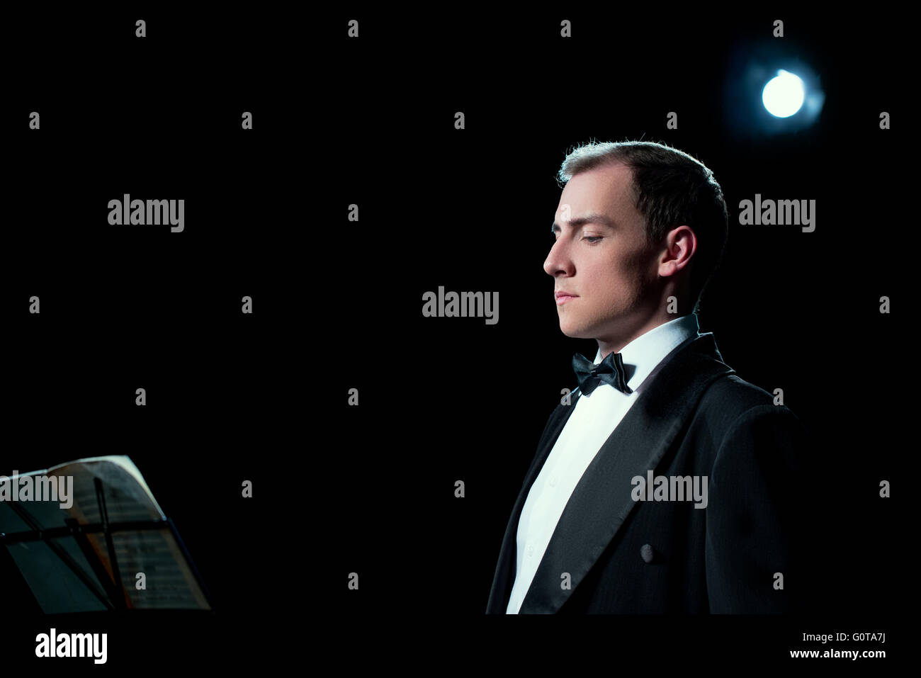 Image of music conductor focused before the show Stock Photo - Alamy