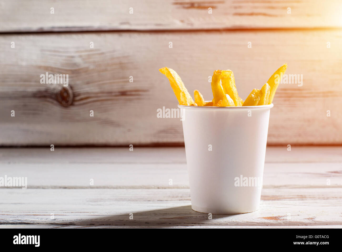French fries in a cup Stock Photo - Alamy