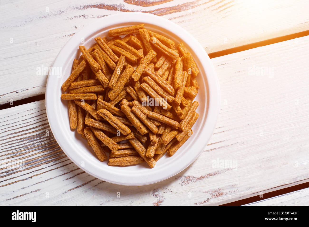 Cracker sticks on a plate Stock Photo - Alamy