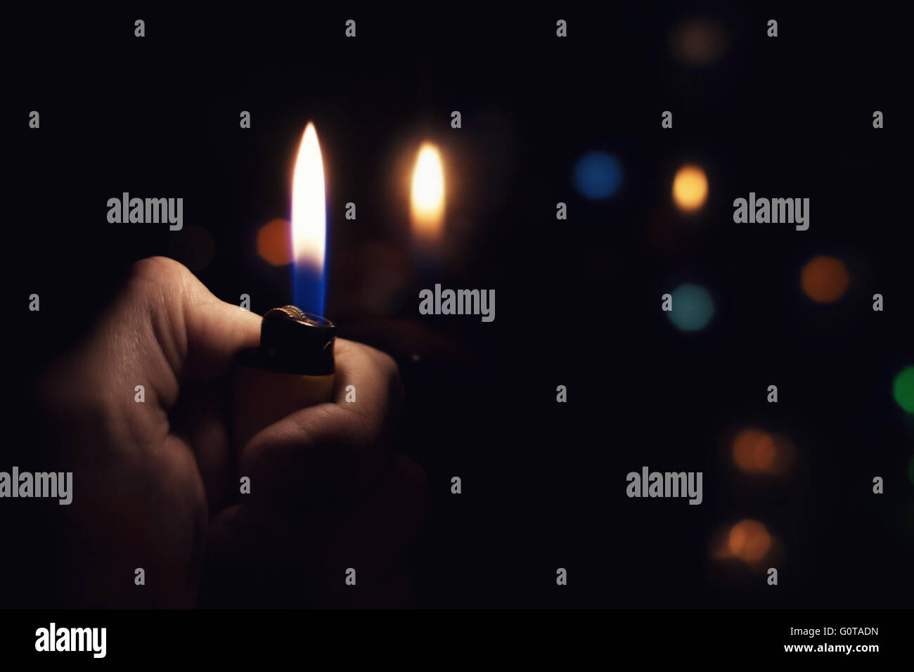 Man hand holding lighter white hi-res stock photography and images - Alamy