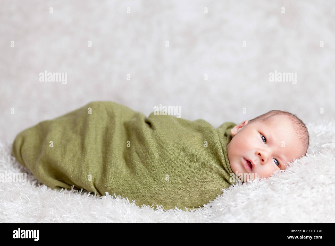 Baby wrapped hi-res stock photography and images - Alamy