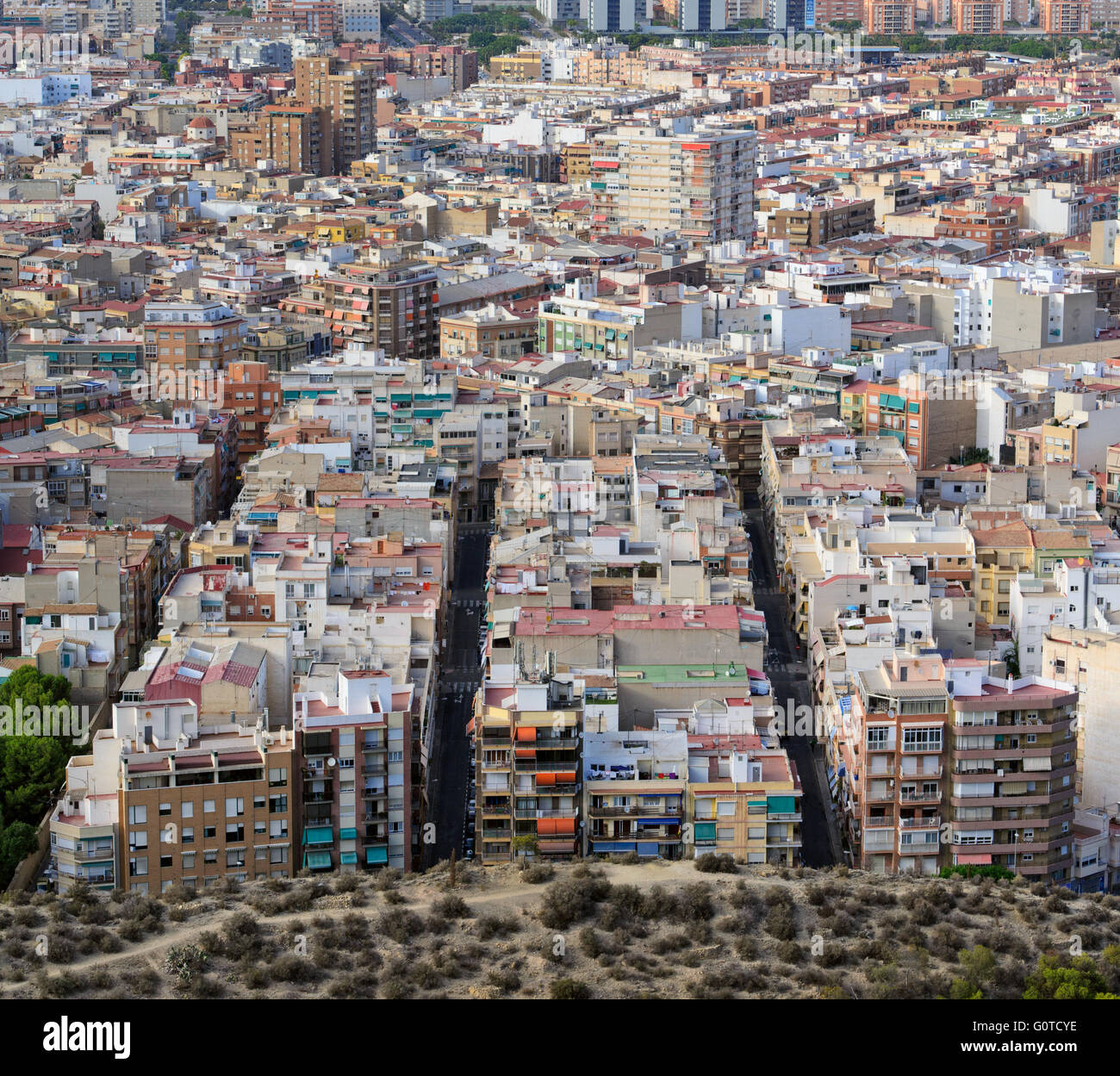Houses sight among urban buildings Alicante, Spain Stock Photo - Alamy