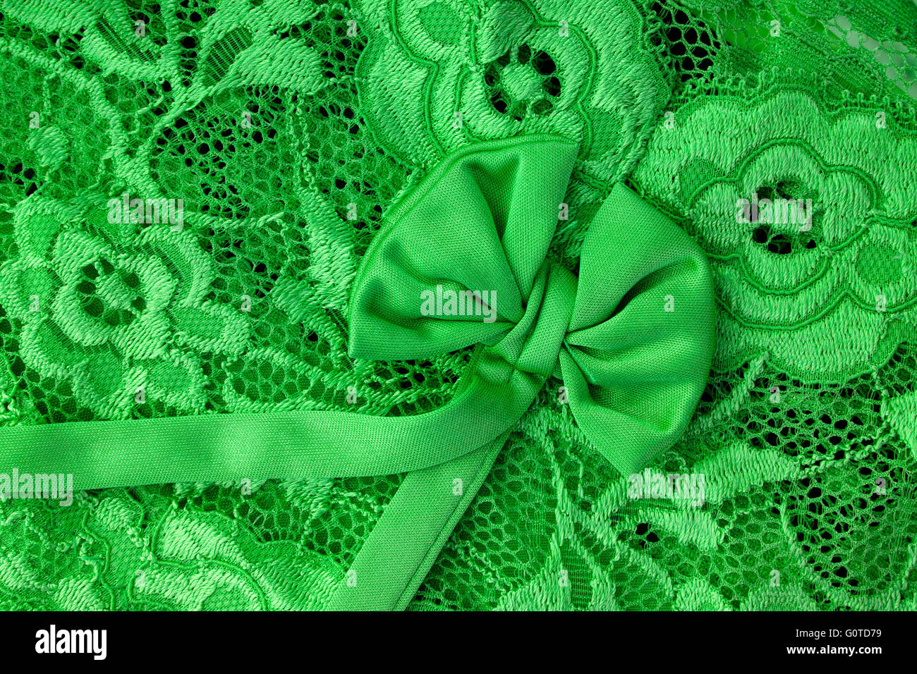 Green lace with bow background Stock Photo - Alamy