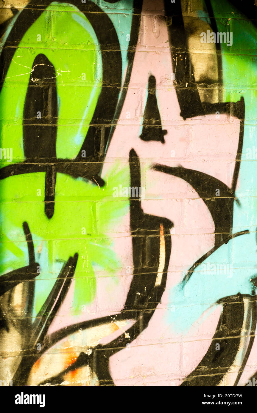 Abstract section of graffiti street art on a wall Stock Photo - Alamy
