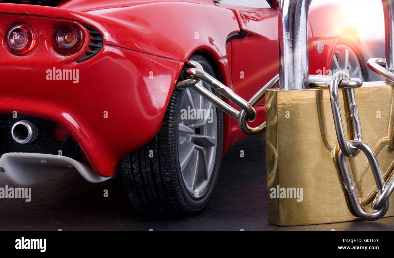 Car chained with padlock close up Stock Photo - Alamy