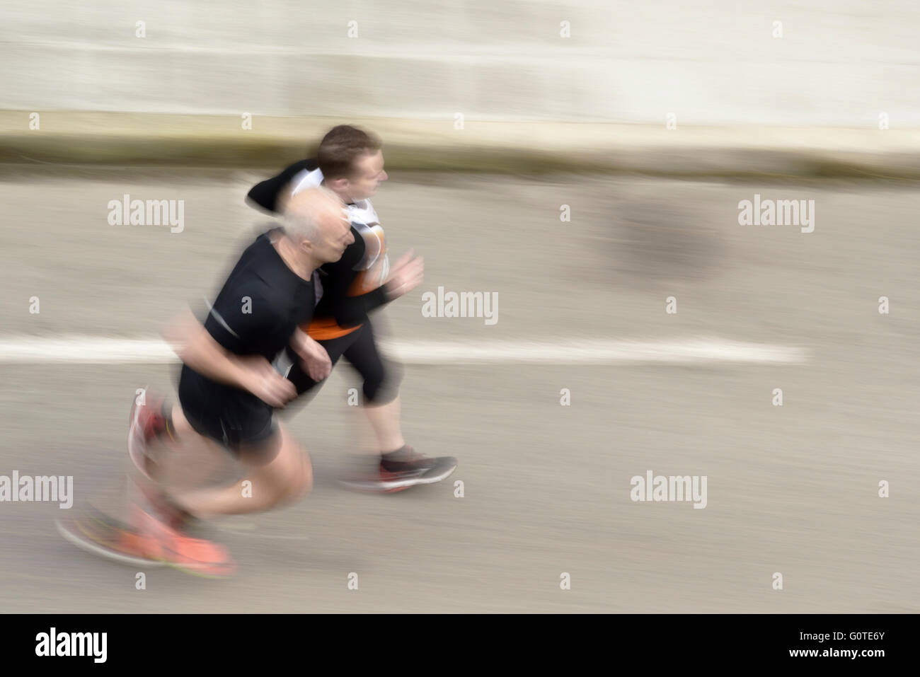 Marathon Runners seen from above Stock Photo - Alamy