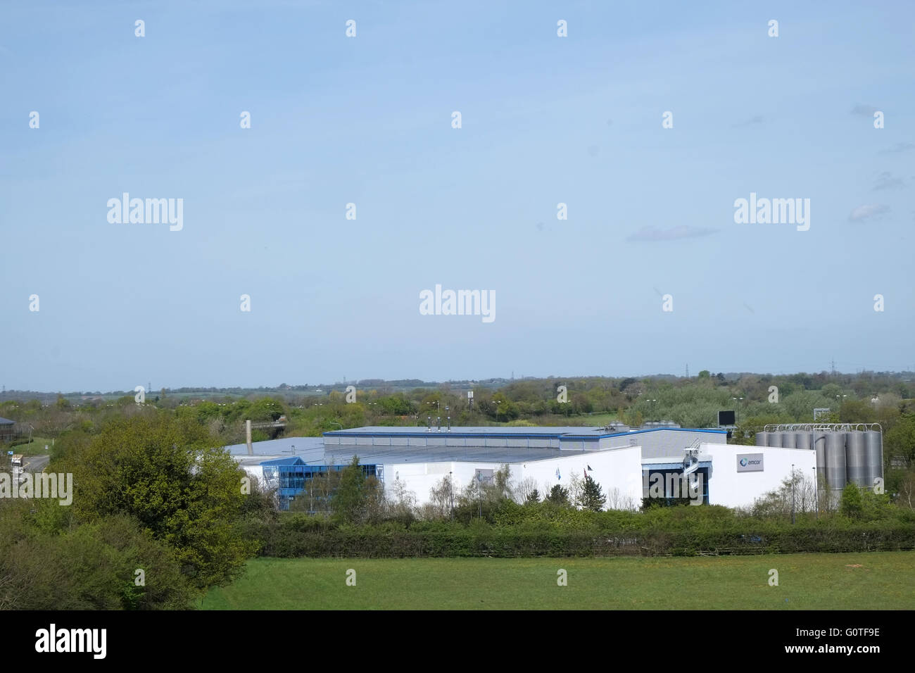Large industrial unit located in the countryside, with adjacent fields ...