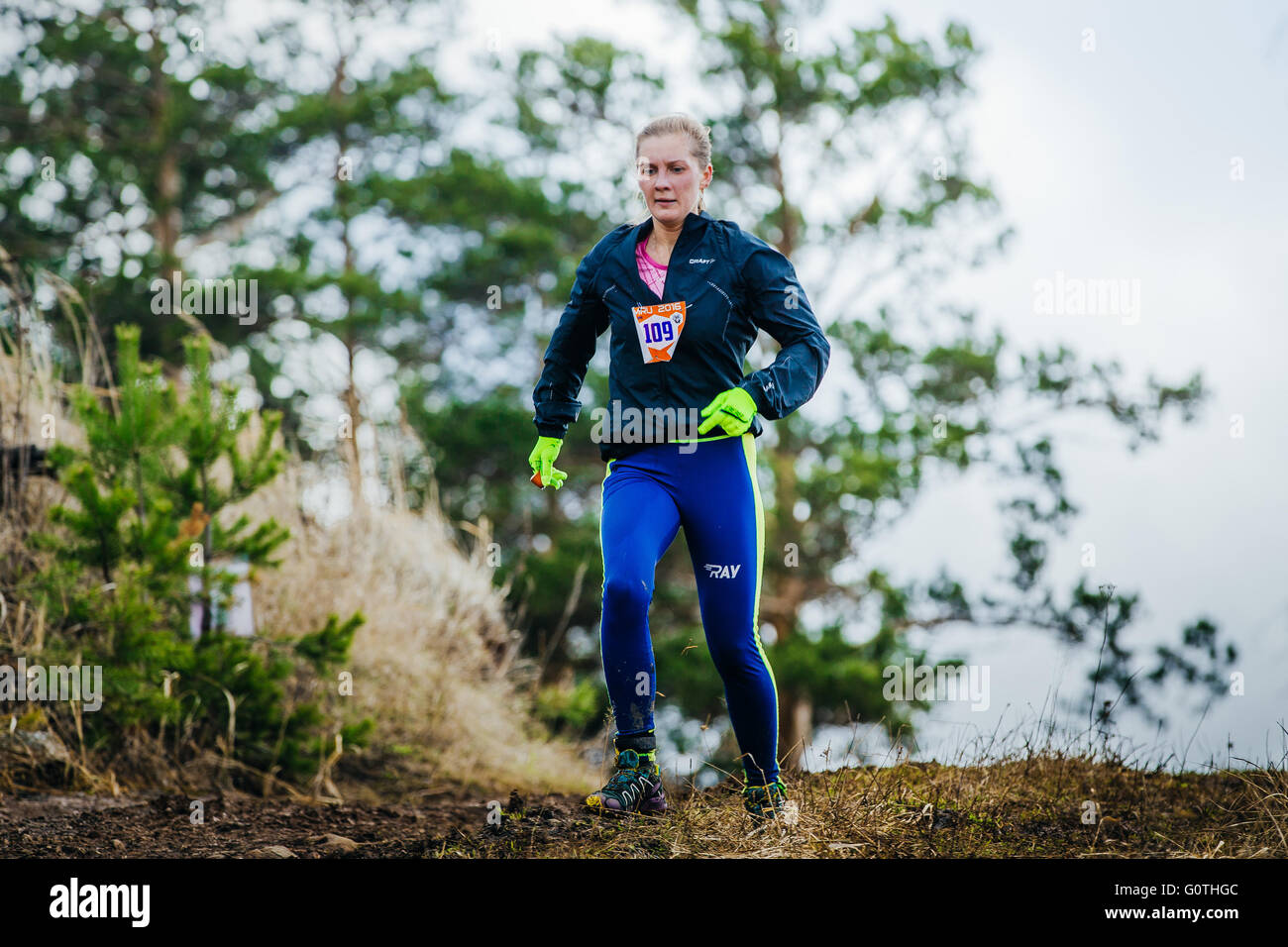 young woman athlete running with hill during a Mountain marathon Stock ...