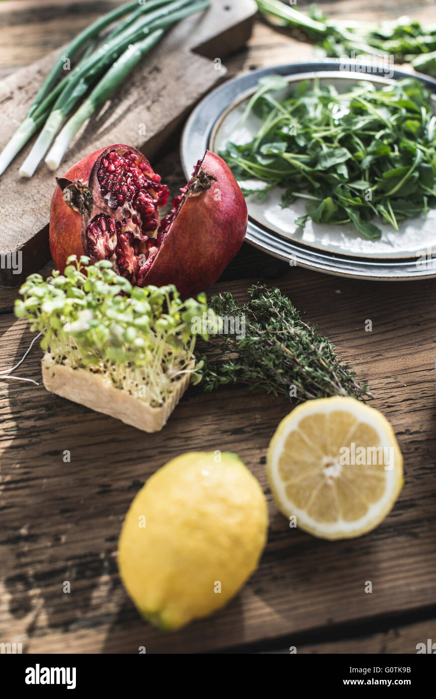 Rocket, spring onion, cress, lemon, pomegranate and thyme Stock Photo ...