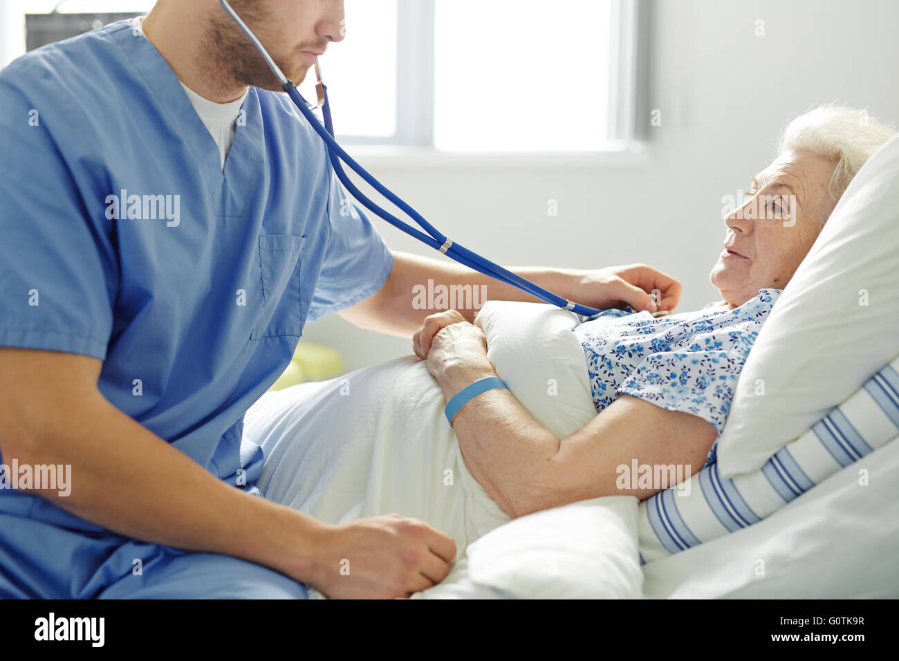 Taking care of patient Stock Photo - Alamy