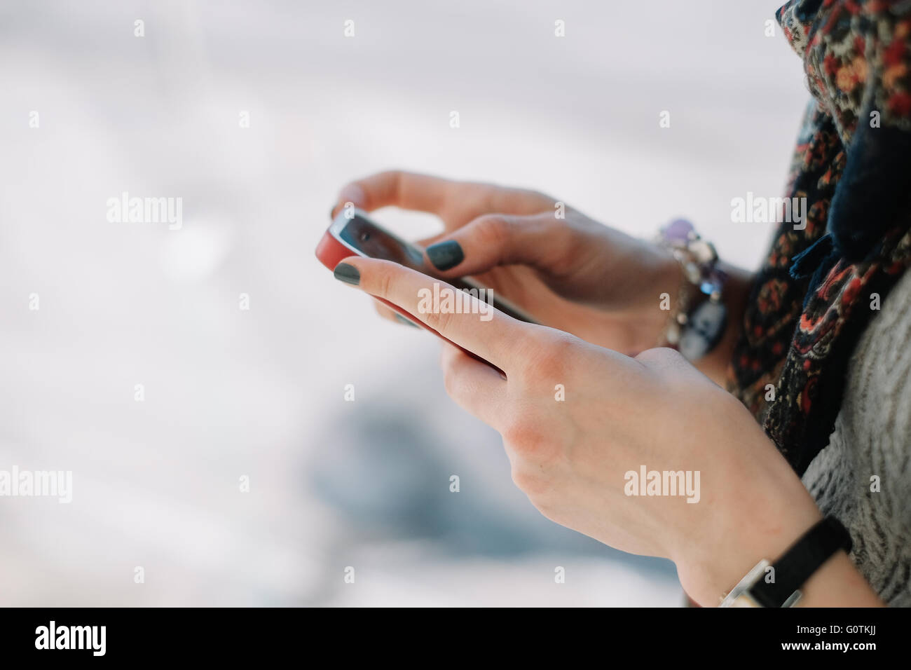 Close-up of woman using mobile phone Stock Photo - Alamy