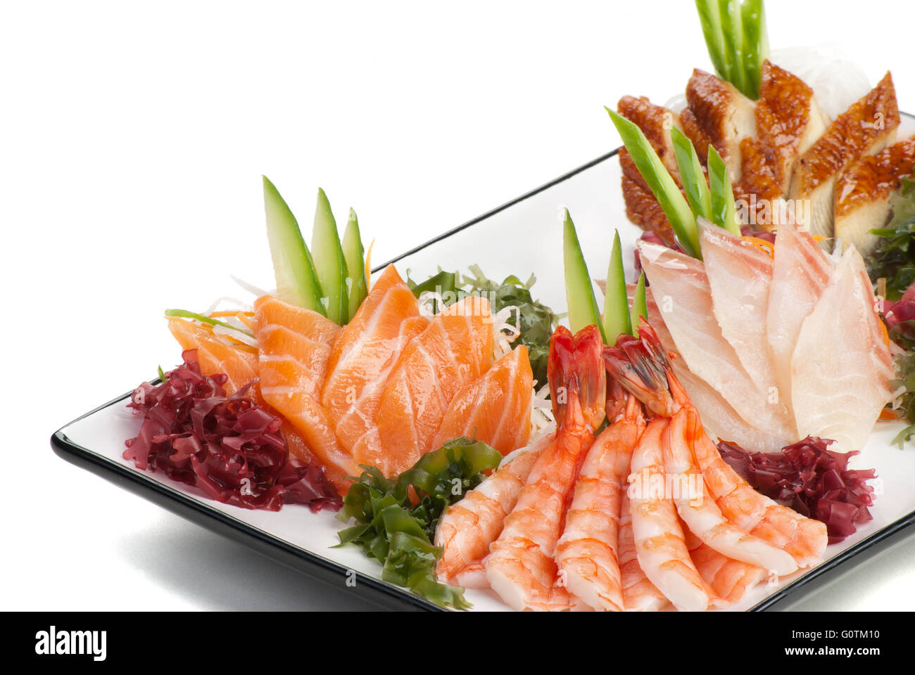 Set of Sashimi on Daikon with Seaweed, Cucumber Stock Photo - Alamy