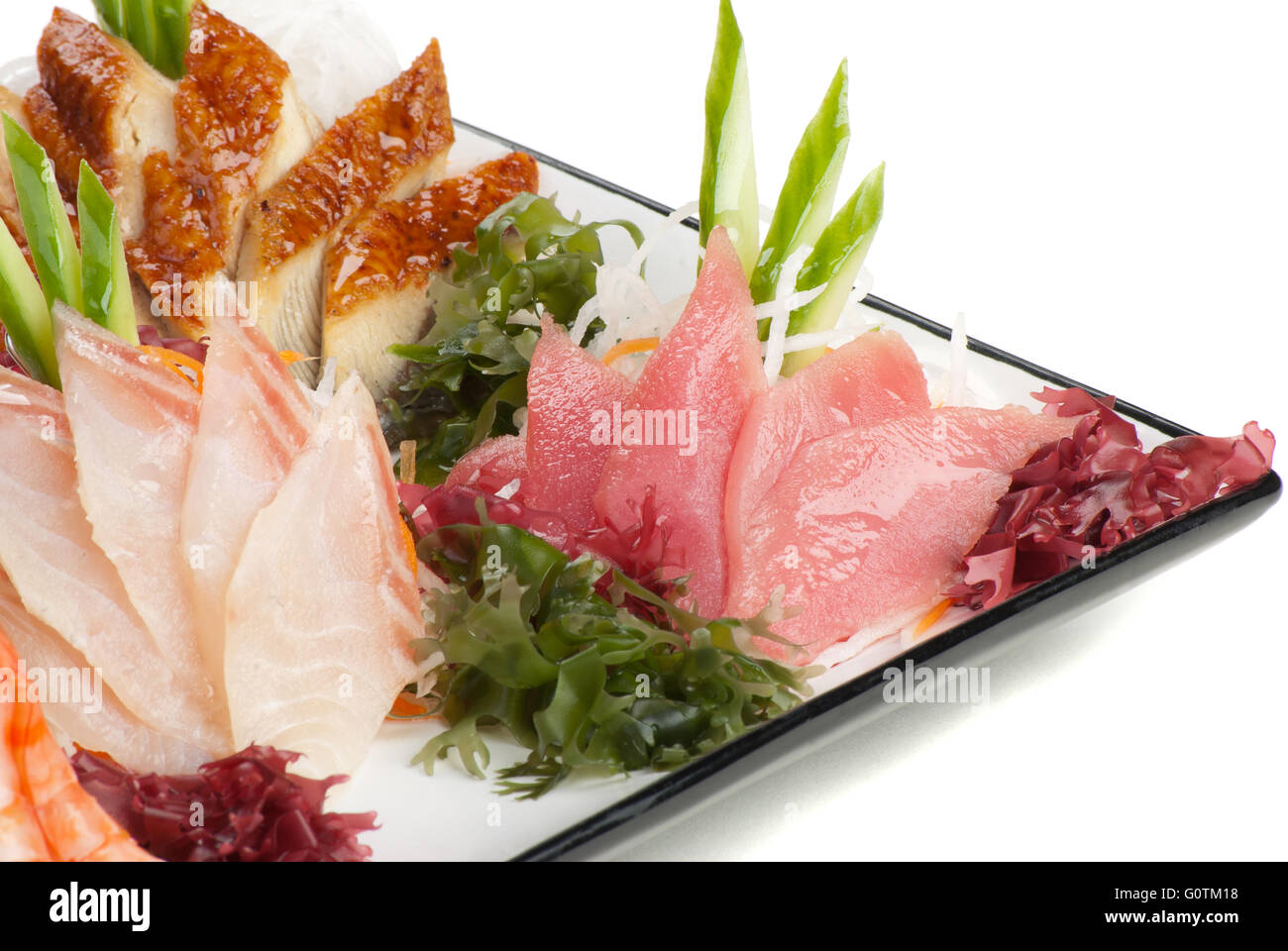 Set of Sashimi on Daikon with Seaweed, Cucumber Stock Photo - Alamy