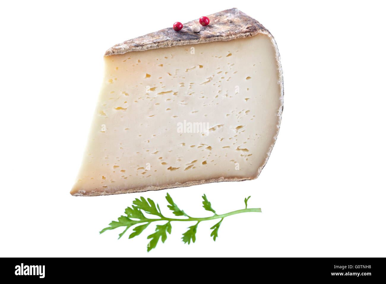 Tomme de Savoie, a semi firm french cheese Stock Photo - Alamy