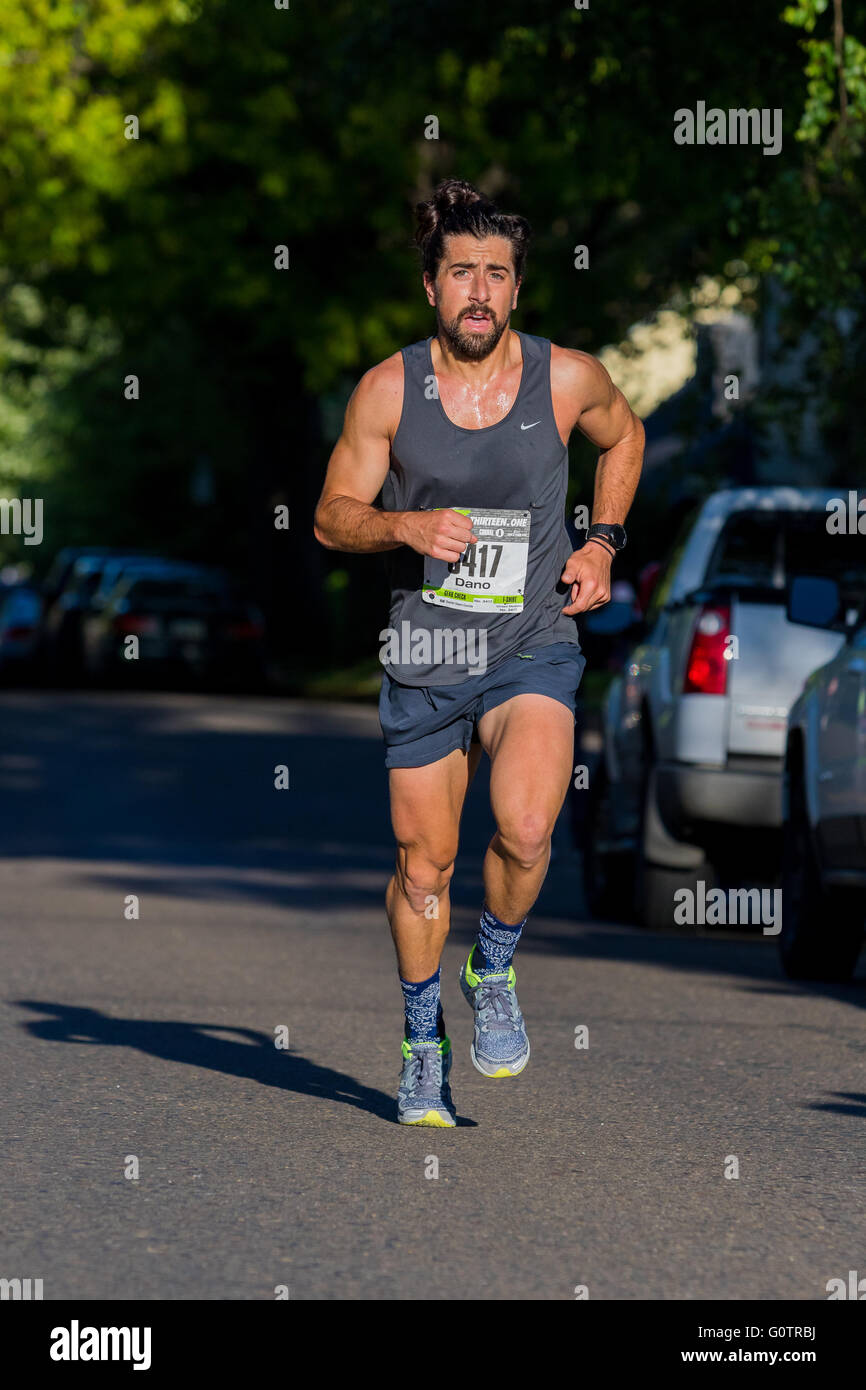 EUGENE, OR - MAY 1, 2016: Daniel Owen Comite comes over University Hill ...
