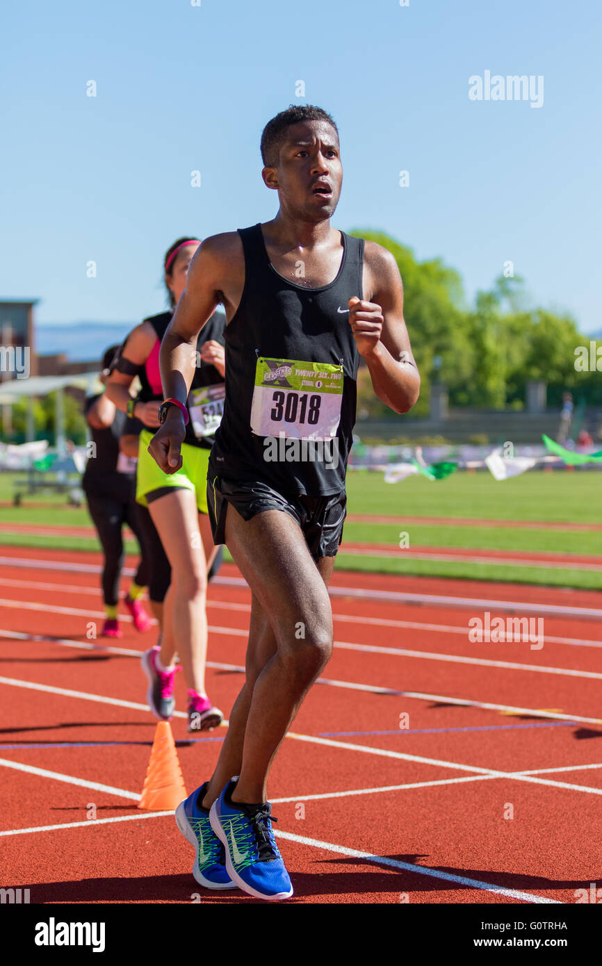 EUGENE, OR - MAY 1, 2016: Runner approaching the finish line on the ...