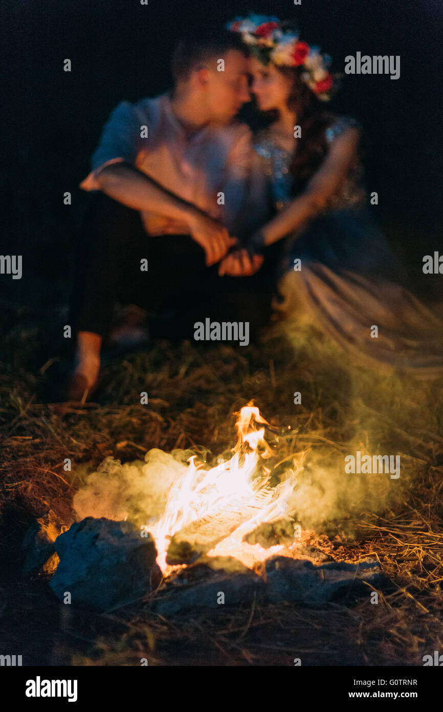 Family Sitting Around Fire Stock Photos & Family Sitting Around Fire ...