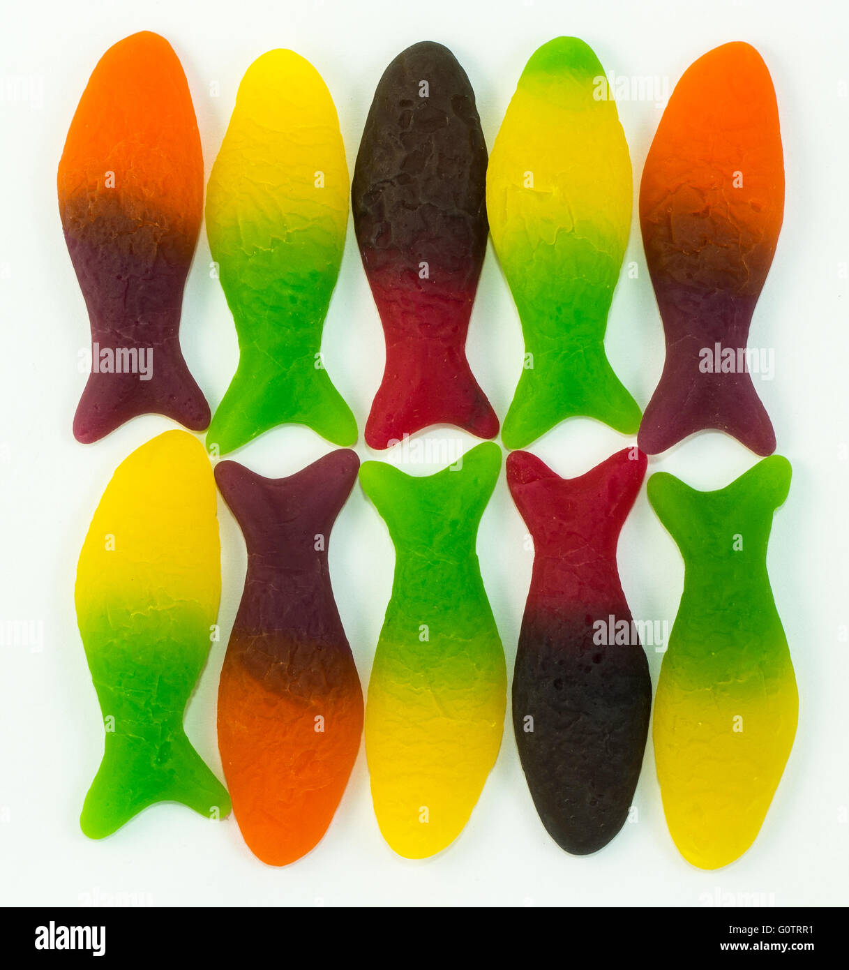Ten colorful sweets shapes of fish Stock Photo - Alamy