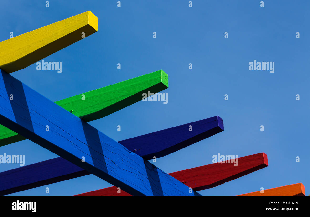 Some colorful wooden roof beams with a blue sky background Stock Photo ...
