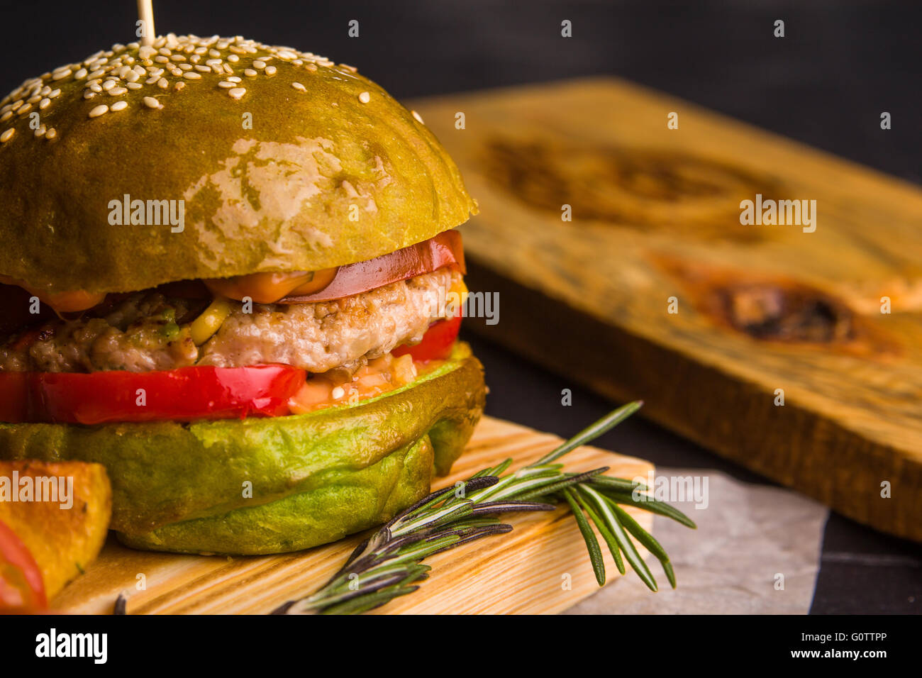 gourmet homemade burger with garnish Stock Photo - Alamy