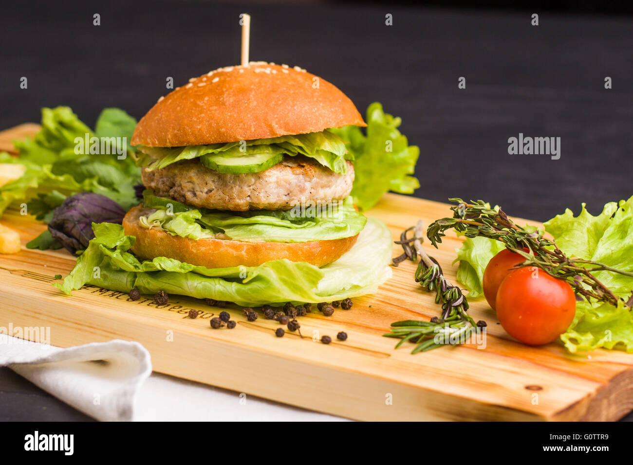 gourmet homemade burger with garnish Stock Photo - Alamy
