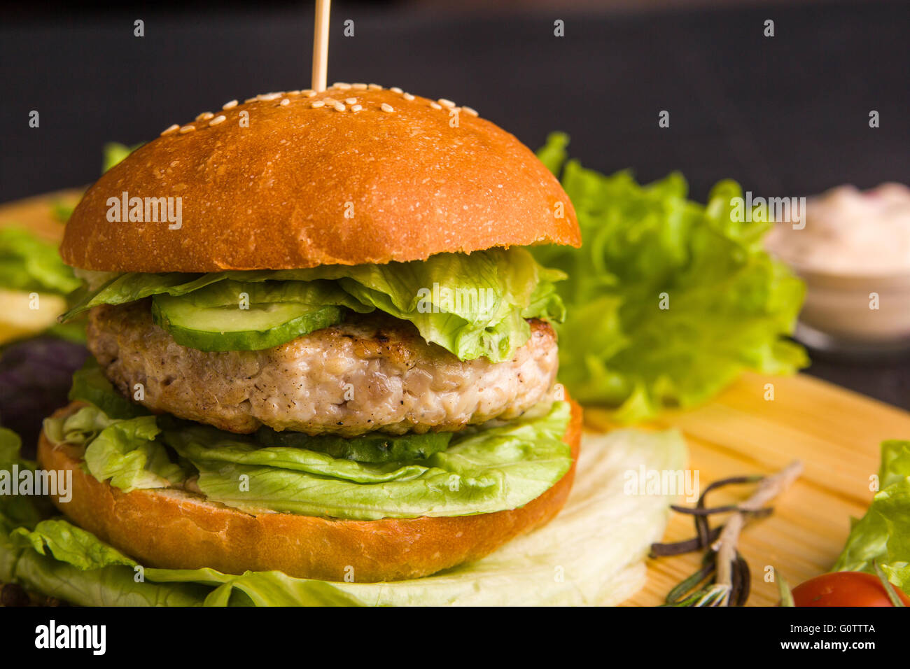 gourmet homemade burger with garnish Stock Photo - Alamy