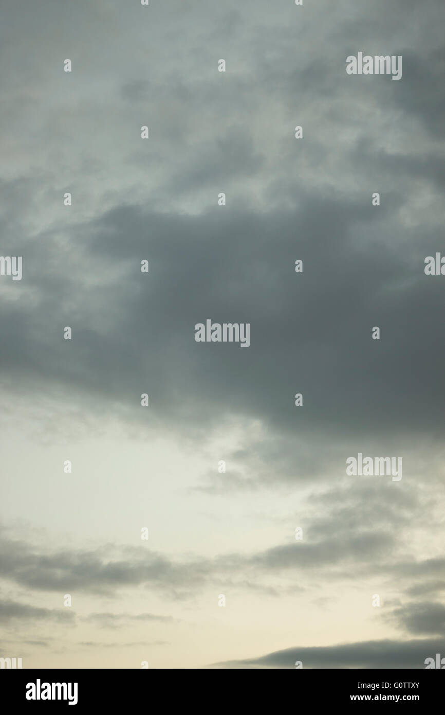 Stormy gray blue cloudy sky with clouds color photo Stock Photo - Alamy