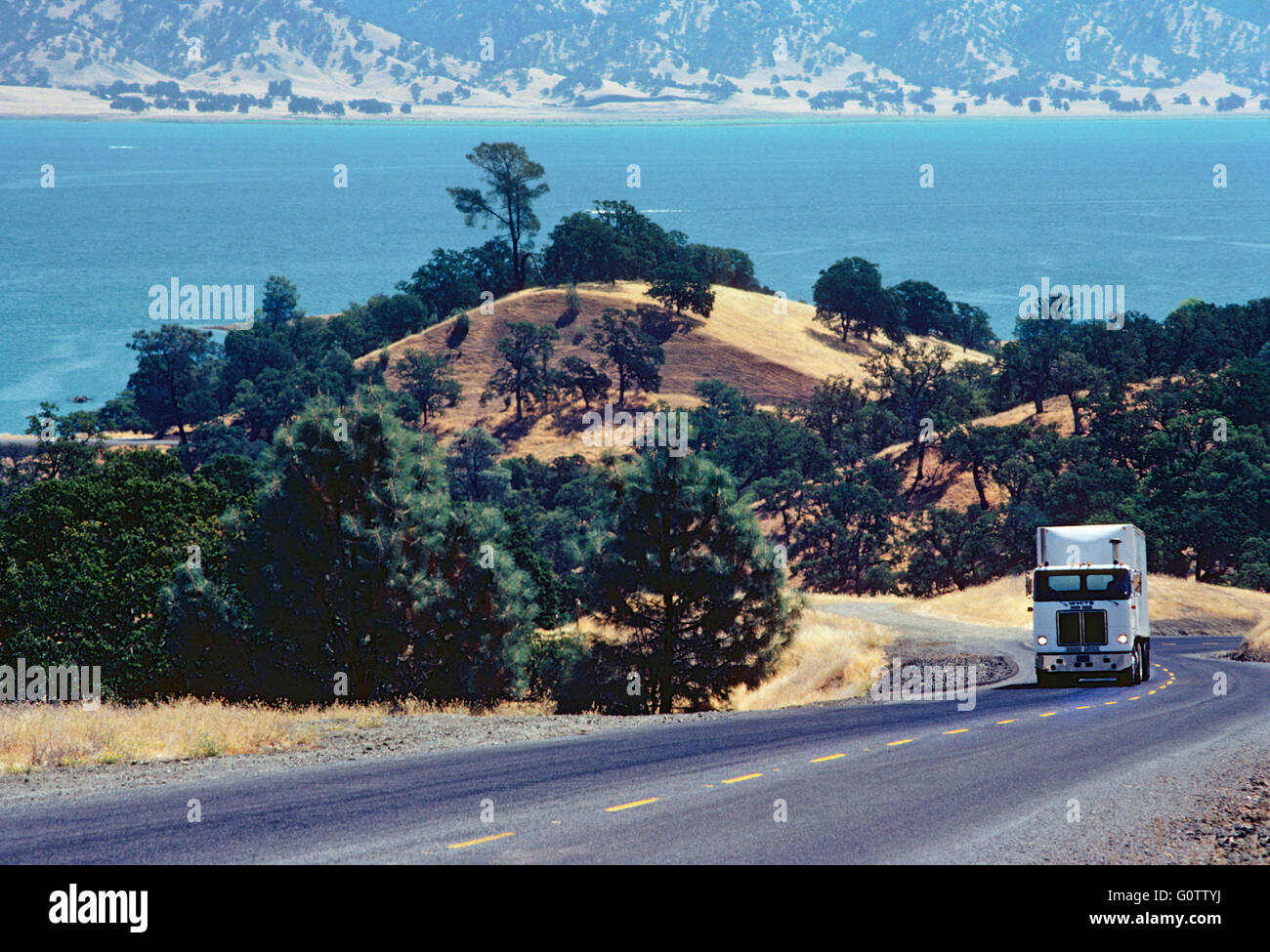 Tractor trailer truck traveling in California countryside Stock Photo ...