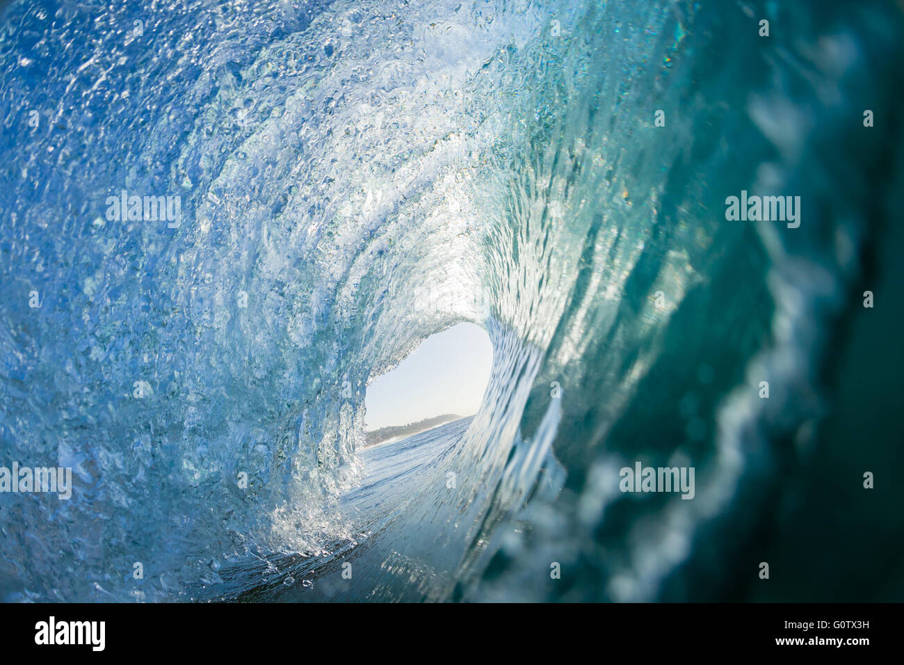 Ocean blue wave crashing swimming inside closeup encounter of water ...