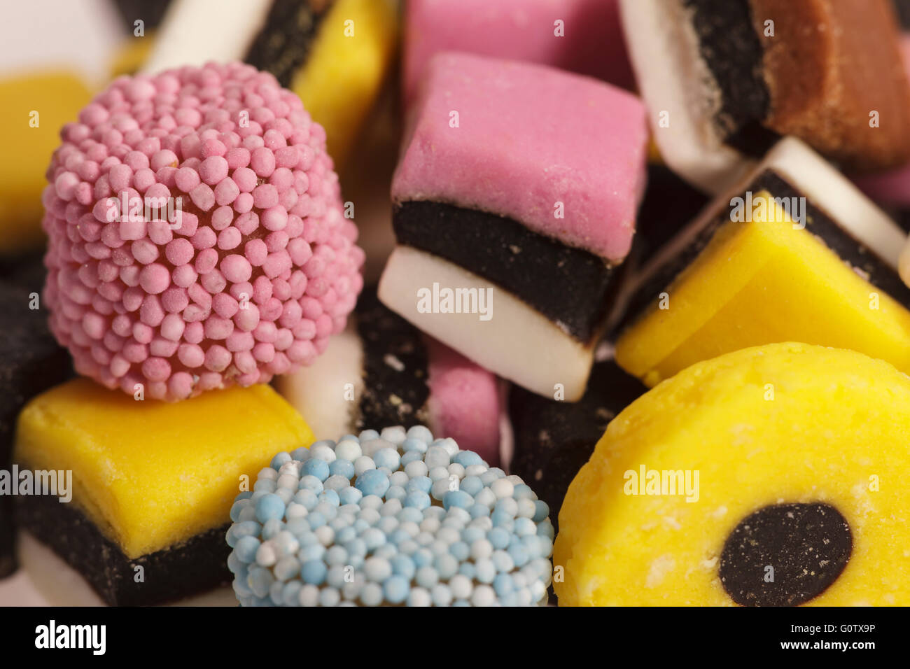 Close up macro shot of a pile of liquorice allsorts sweets Stock Photo ...